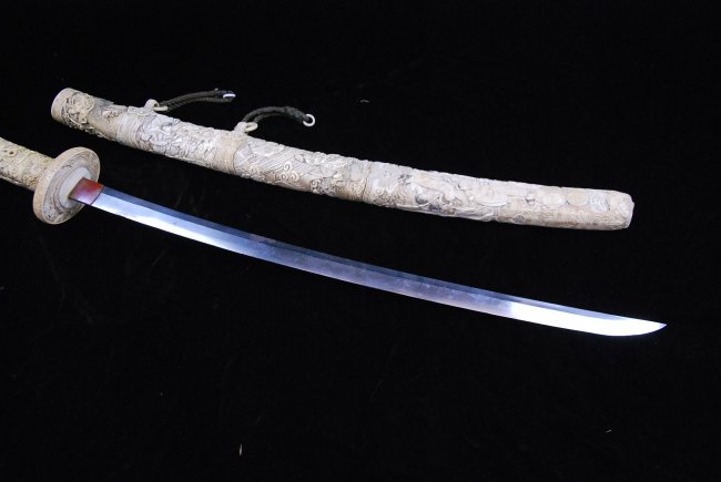 JAPANESE CARVED IVORY SWORD (MEIJI PERIOD, 1868-1912) : Lot 199
