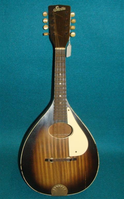 Stella 8 String Mandolin. Note: Back has an approximate : Lot 117