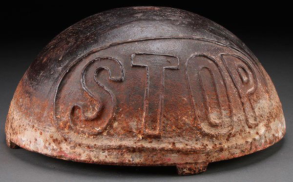 A CAST IRON TRAFFIC BUTTON STOP SIGN, CIRCA 1920S : Lot 248