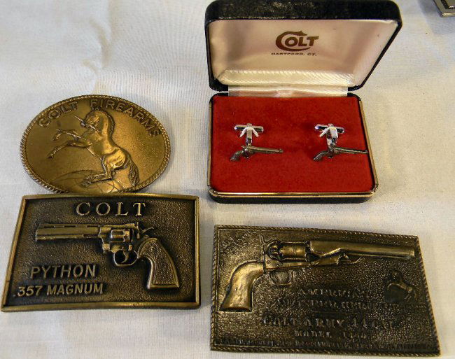 Lot of seven Colt Firearms belt buckles (four with orig : Lot 64L