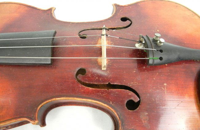 Joseph Guarnerius violin in case, label inside violin m : Lot 519